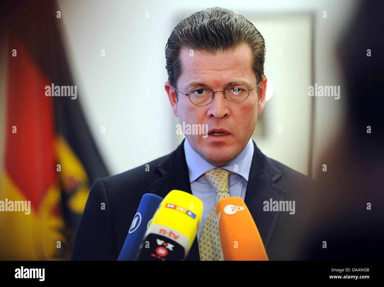 German Minister of Defence Karl-Theodor zu Guttenberg speaks to ...