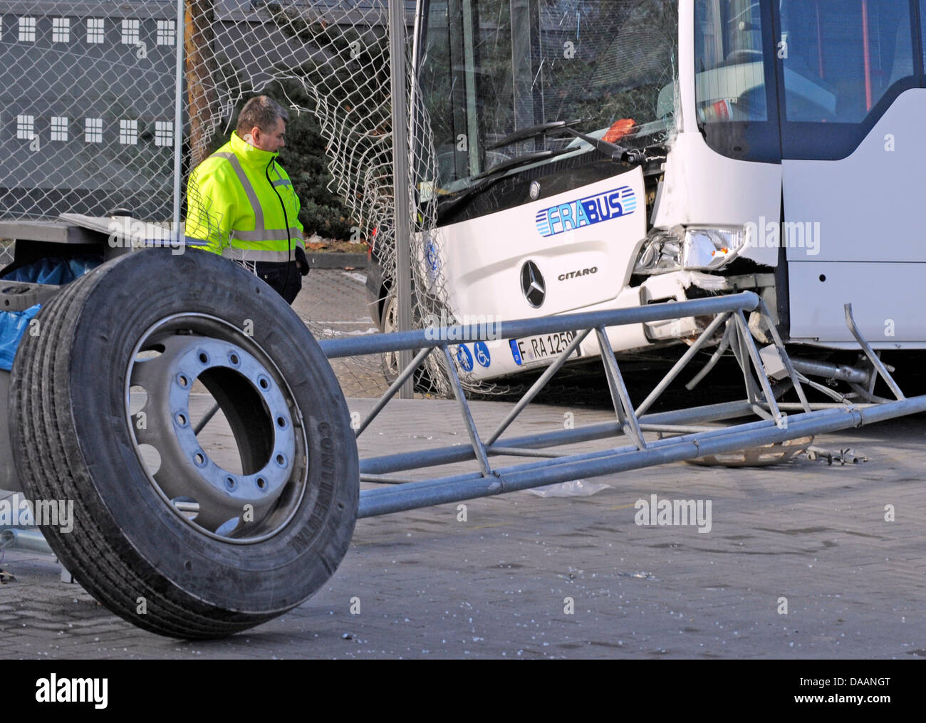 Police investigators secure evidence after a bus accident at the ...