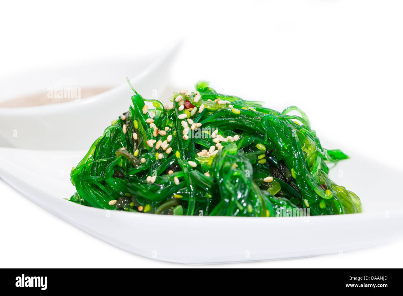 salad with exotic marine algae on a white background Stock Photo - Alamy