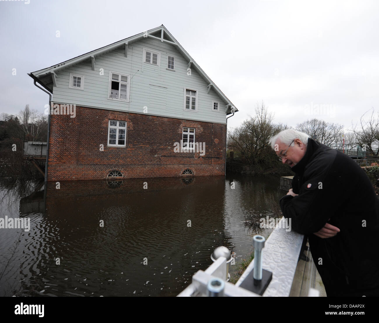 Prime Minister of Schleswig-Holstein Peter Harry Carstensen looks at ...