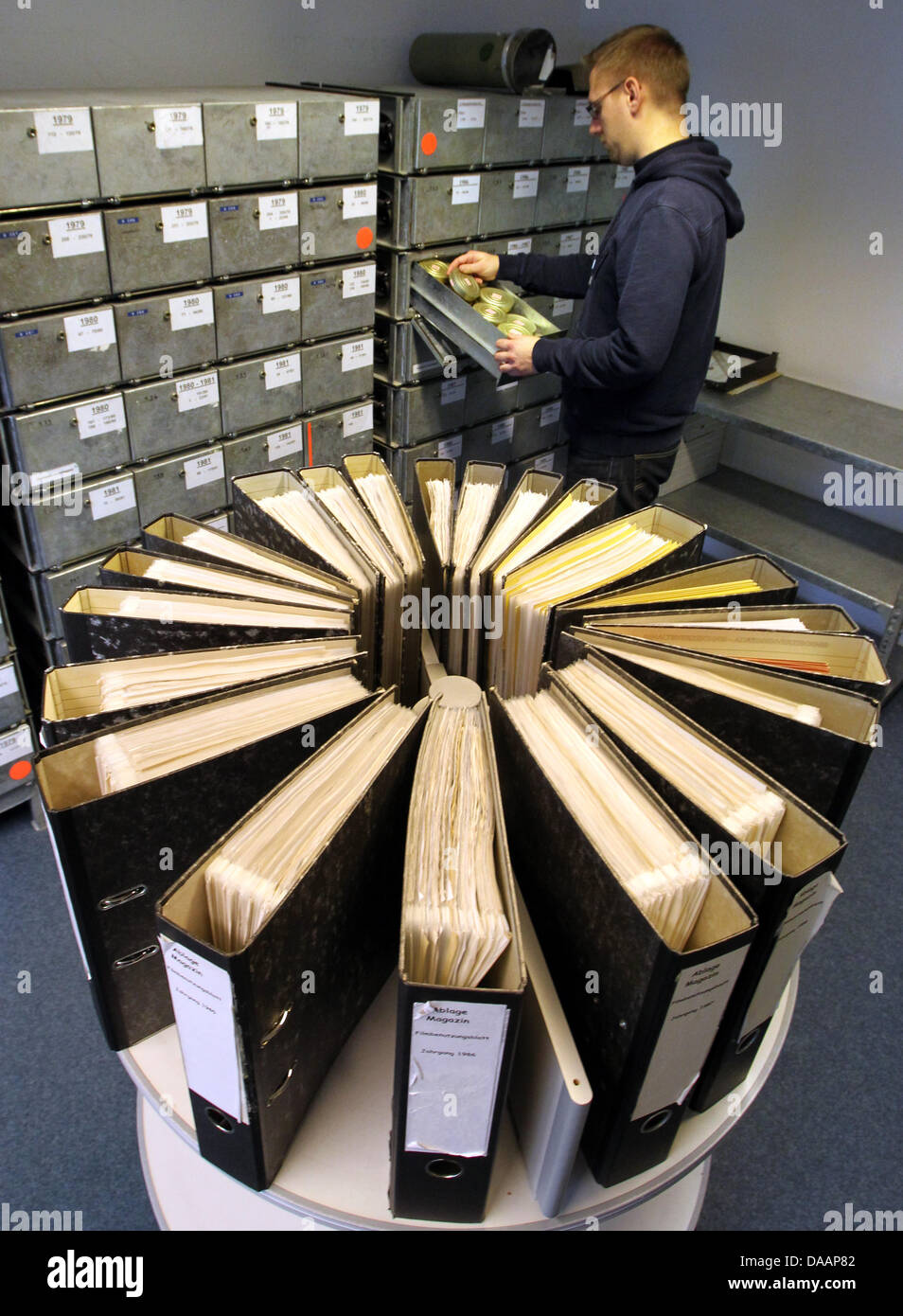 Kai Netuschil, head of the local Stasi records magazine, skims through ...