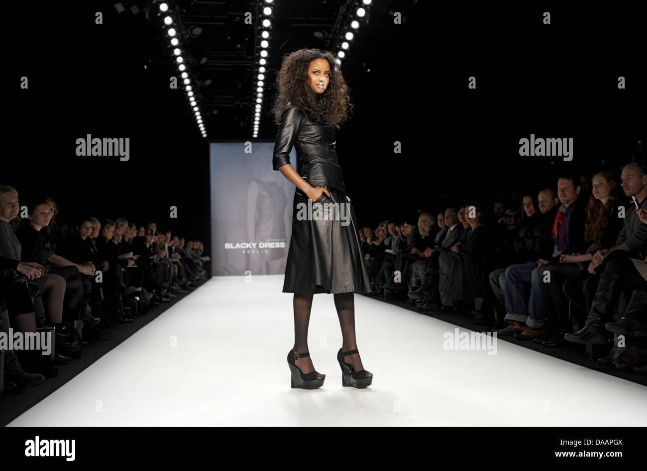 German model Lena Gercke presents a creation at the Blacky Dress show ...