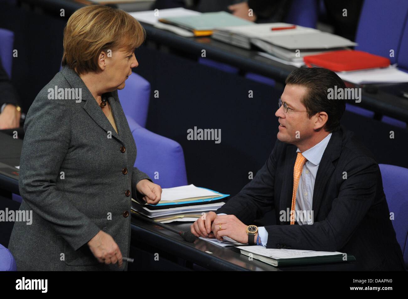 German Chancellor Angela Merkel (L), and German Minister of Defence ...