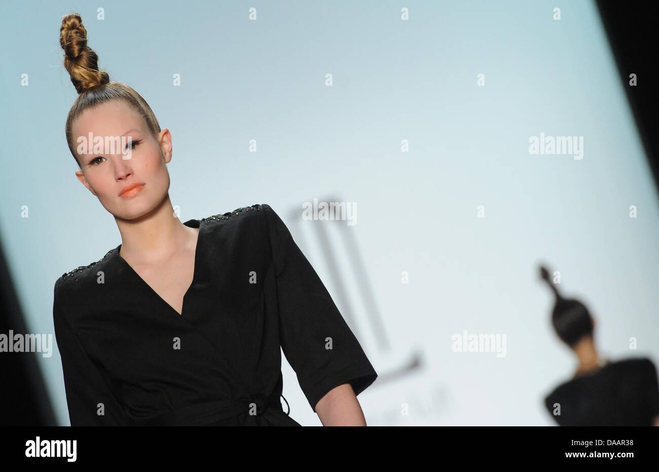 A model presents a creation at Irene Luft fashion show during the ...