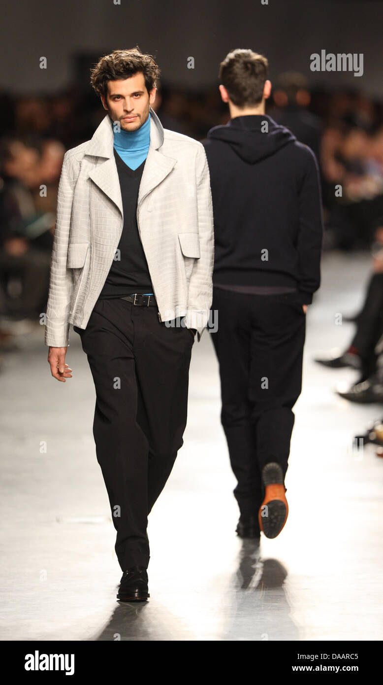 A model wears a creation as part of Hermes Men's fashion fall winter ...