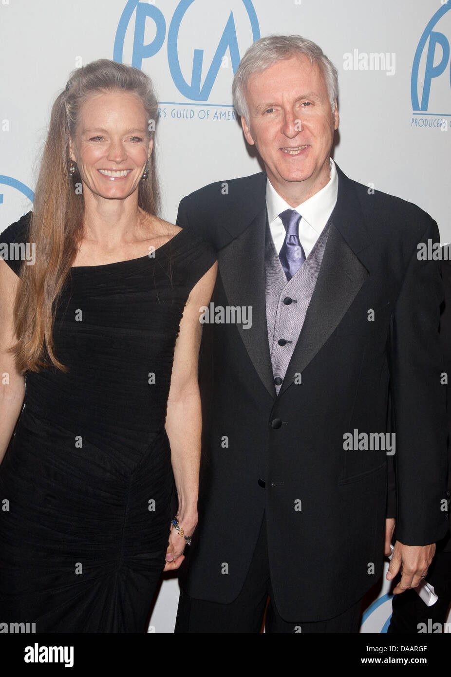 US director James Cameron and his wife, actress Suzy Amis Cameron ...