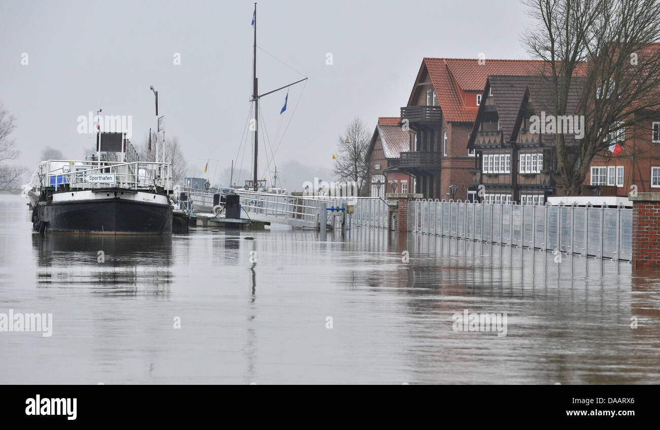 A ship anchors next to the new high water protection wall nearby the ...