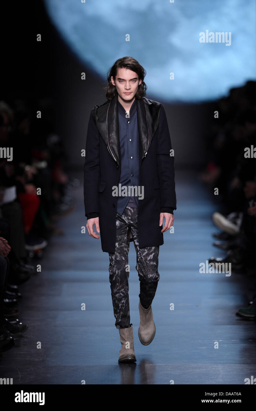 A model wears a creation as part of Paul Smith Men's fashion fall ...