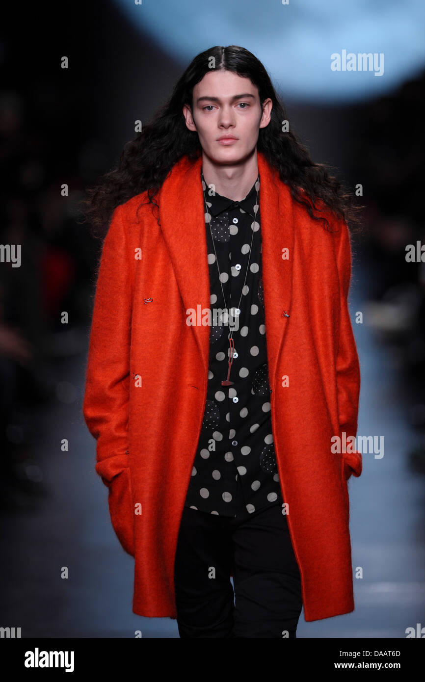 A model wears a creation as part of Paul Smith Men's fashion fall ...