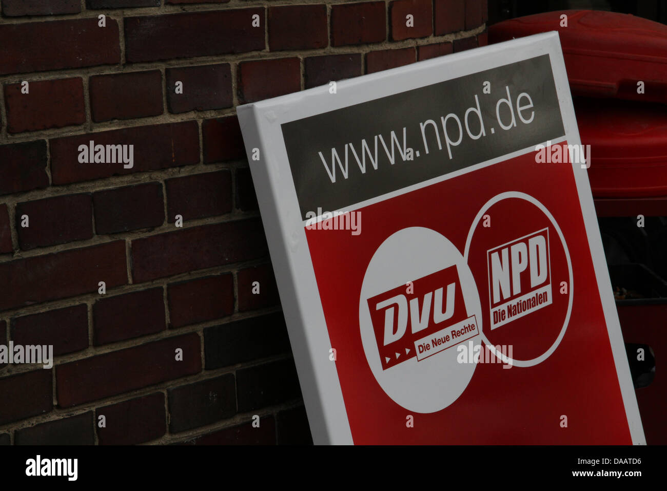 A sign with the logos of the NPD and DVU stands at the Max-Taut Aula in ...