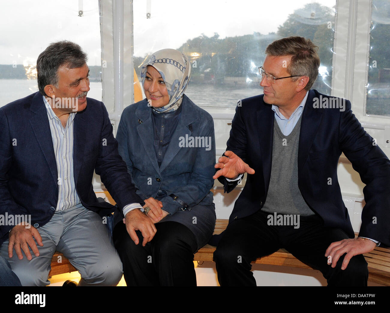 President of Turkey Abdullah Gul (L) and his wife Hayrunisa talk to ...