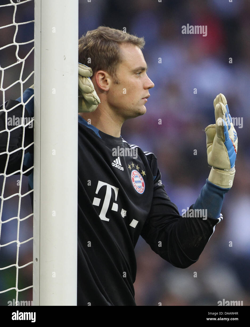 Munich's goalkeeper Manuel Neuer stands in his goal and gestures during ...