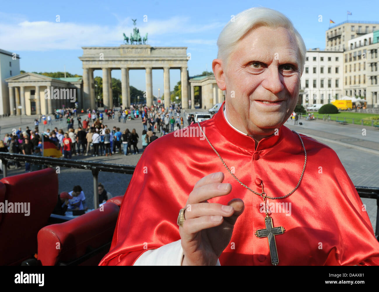 The wax figure of pope Benedict XVI. from Madame Tussauds drives past ...
