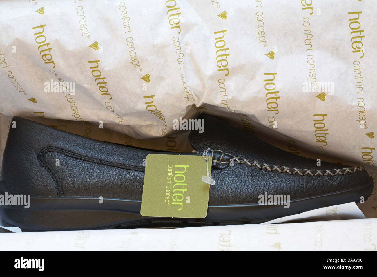 Hotter comfort concept label on shoe in Hotter comfort concept tissue ...
