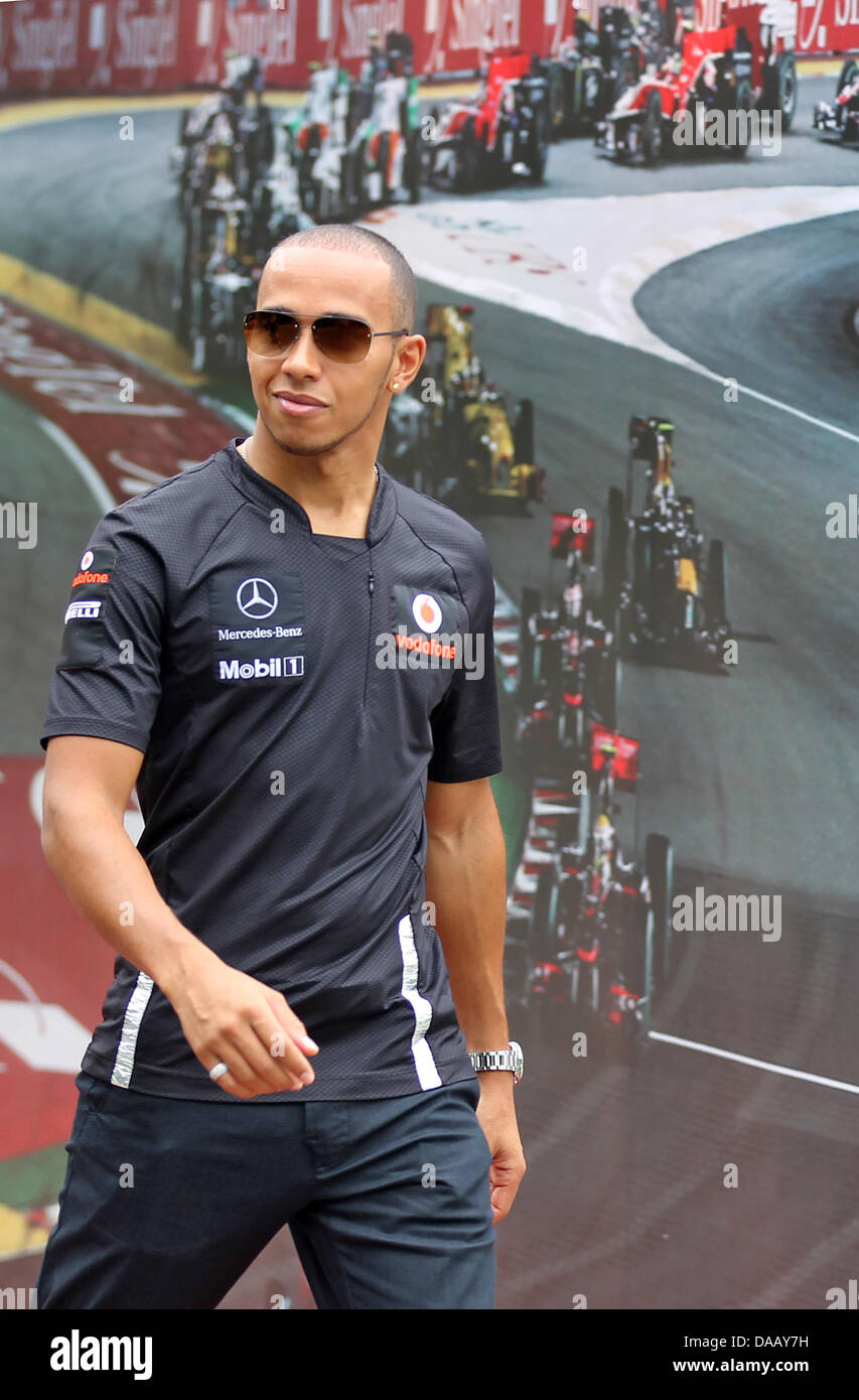 British Formula One driver Lewis Hamilton of McLaren Mercedes arrives ...