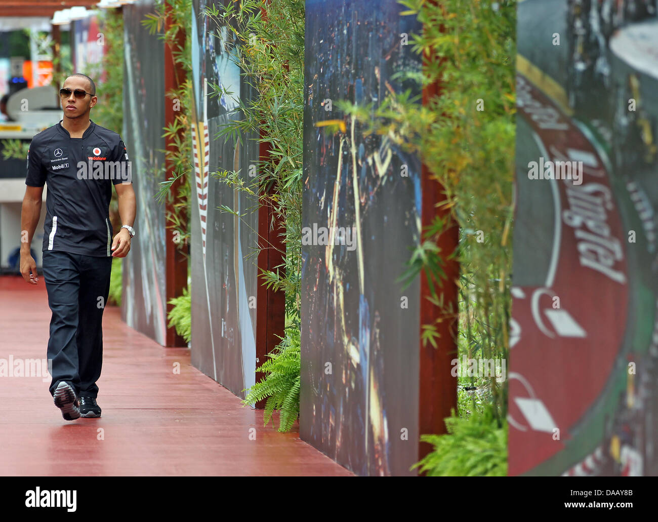 British Formula One driver Lewis Hamilton of McLaren Mercedes arrives ...