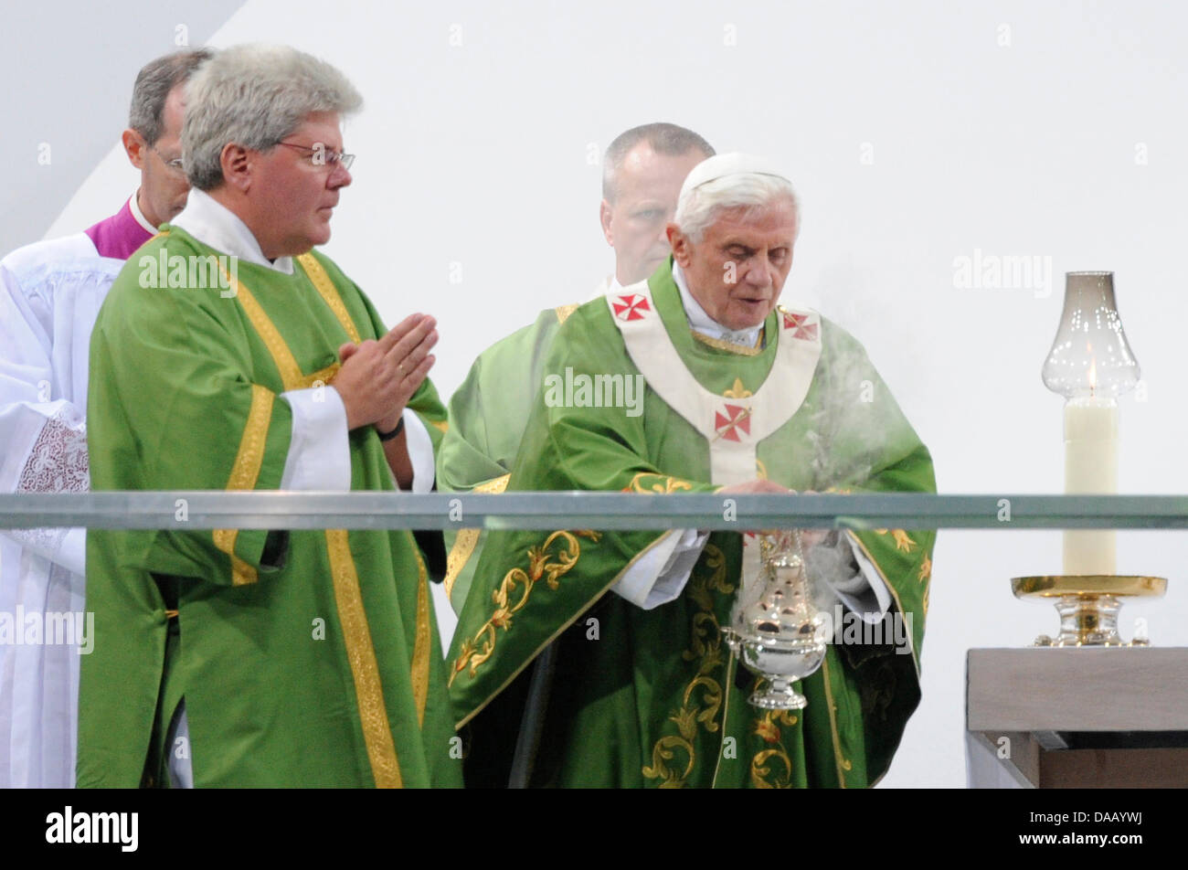 Pope Benedict XVI (C) celebrates the mass at the Olympic stadium in ...