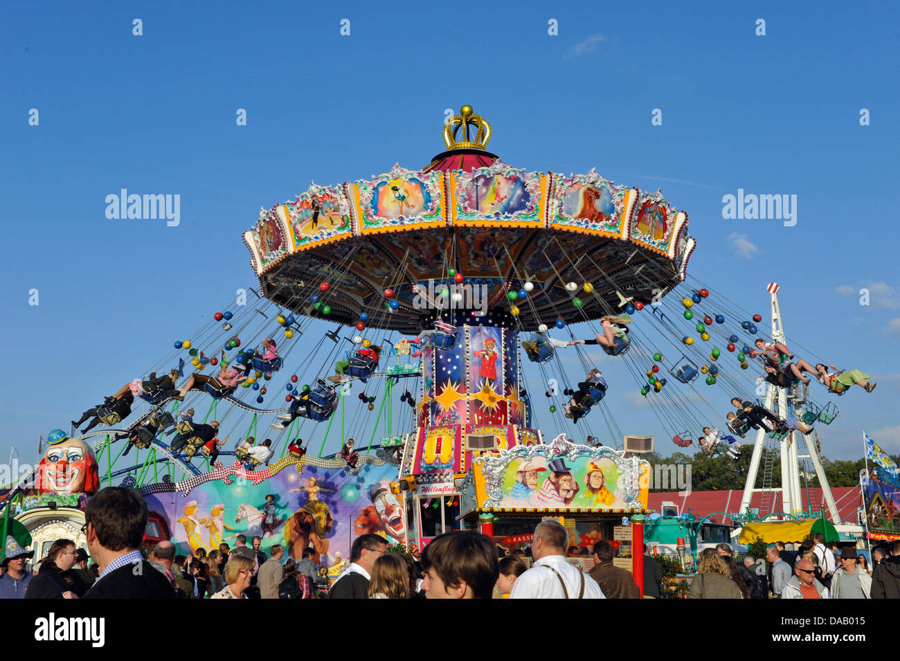 A chairoplane spins around at the Oktoberfest beer festival on the ...