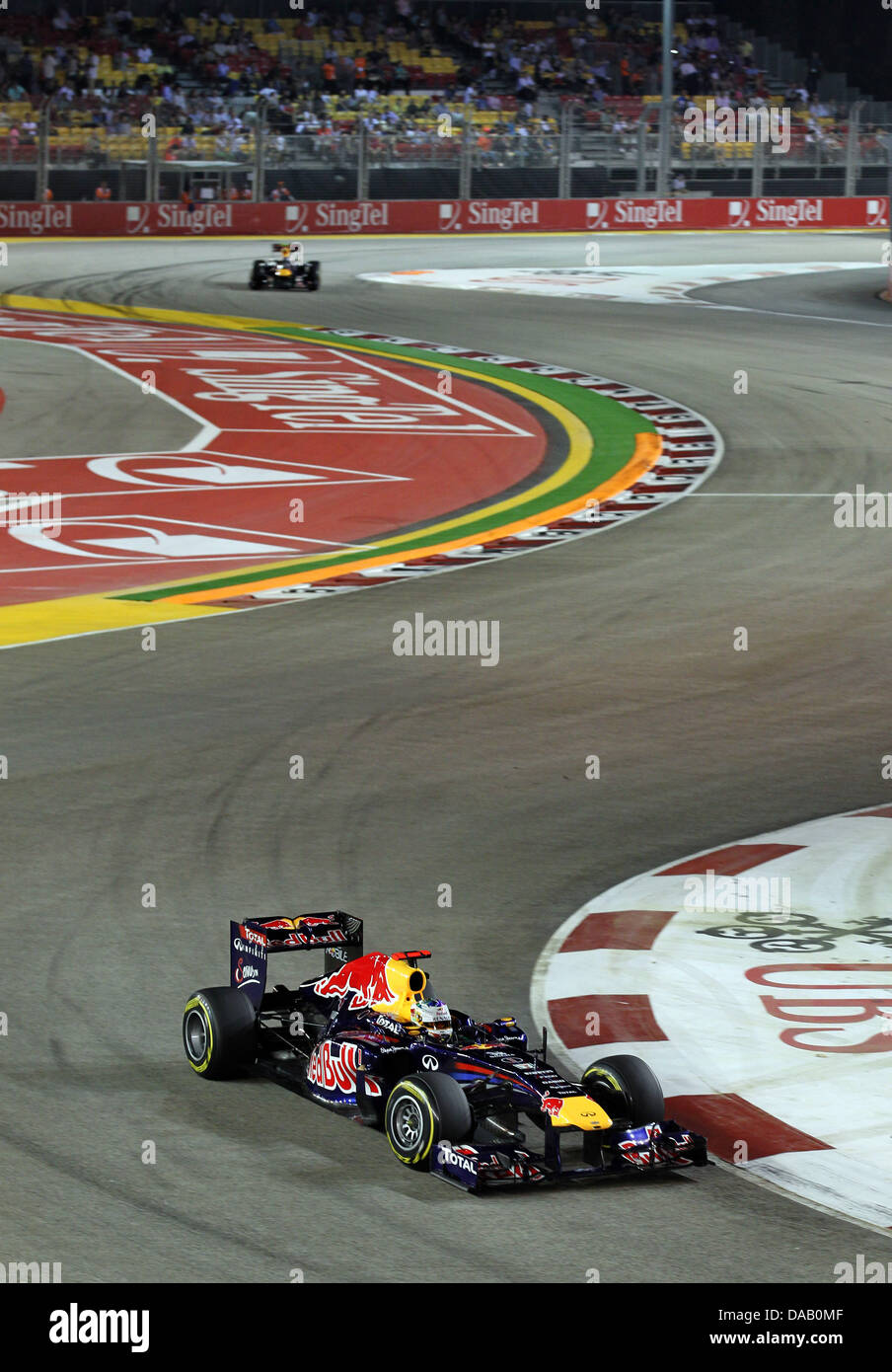 German Formula One driver Sebastian Vettel (front) and Australian ...