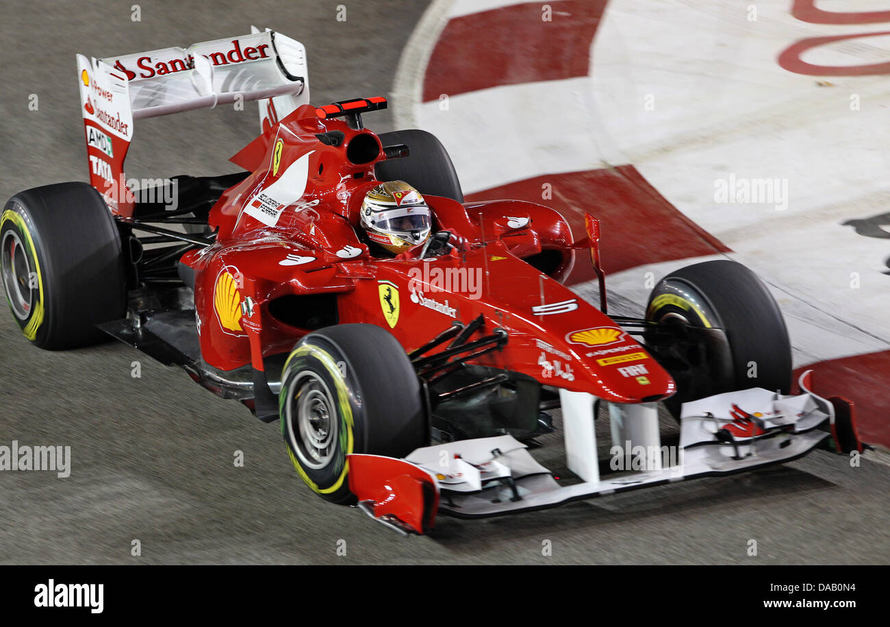 Spanish Formula One driver Fernando Alonso of Ferrari steers his car ...