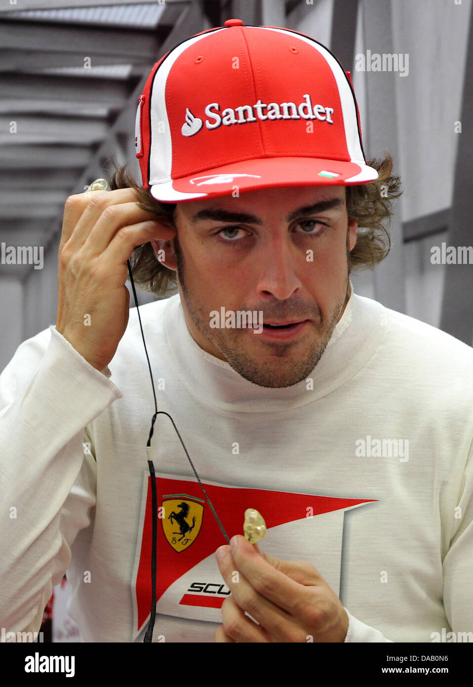Spanish Formula One driver Fernando Alonso of Ferrari prepares before ...