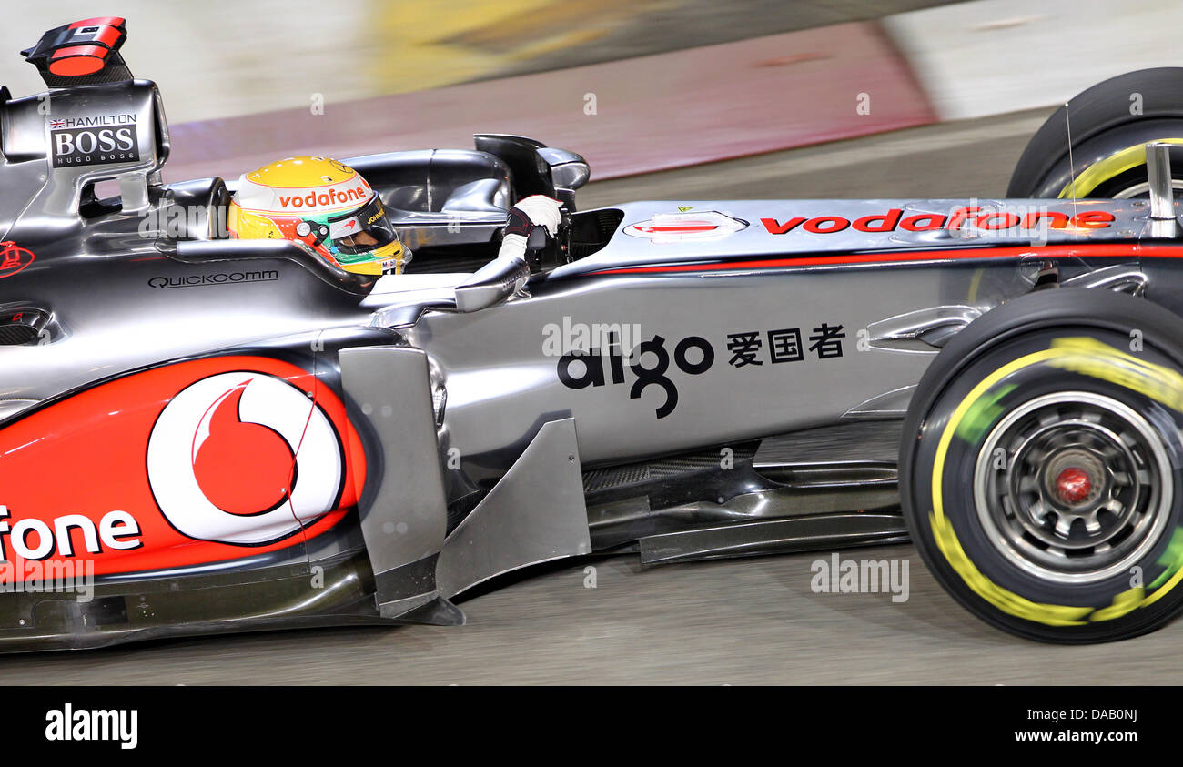 British Formula One driver Lewis Hamilton of McLaren Mercedes steers ...