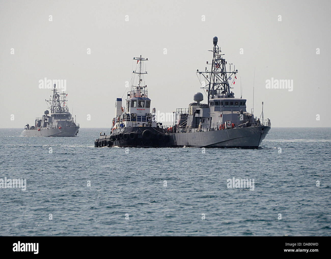 The coastal patrol ships USS Thunderbolt (PC 12) and USS Squall (PC 7 ...