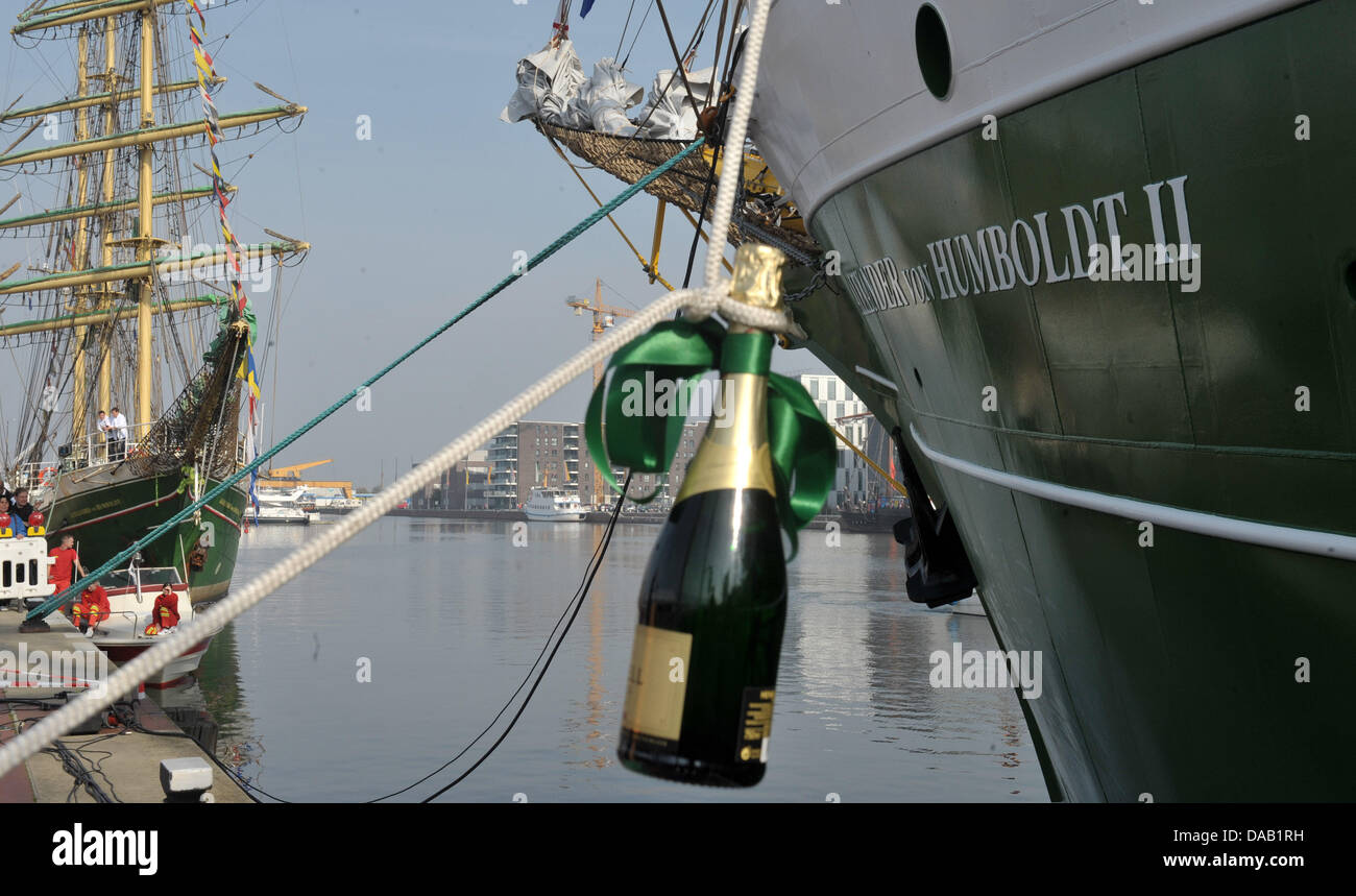 A bottle of champaign hands on a rope ready for the christening of the ...