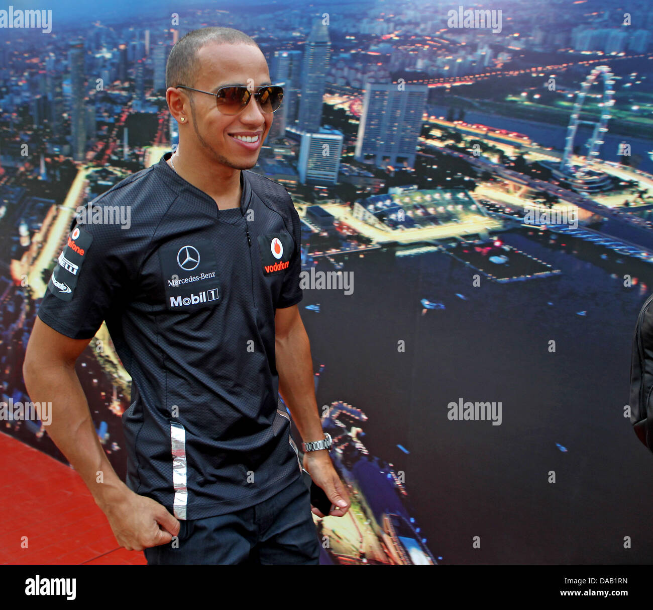 British Formula One driver Lewis Hamilton of McLaren Mercedes walks ...