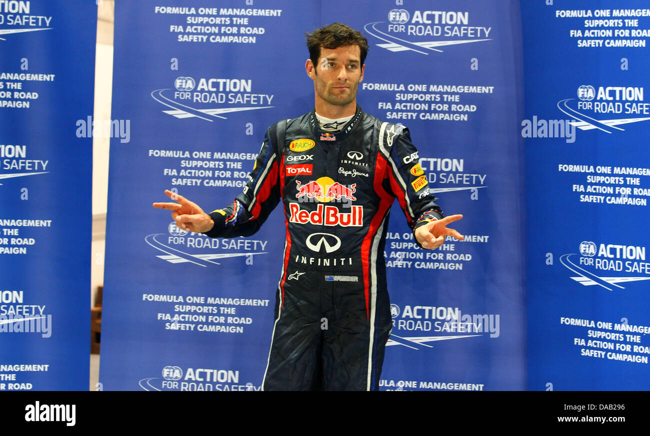 Australian Formula One driver Mark Webber of Red Bull reacts after the ...