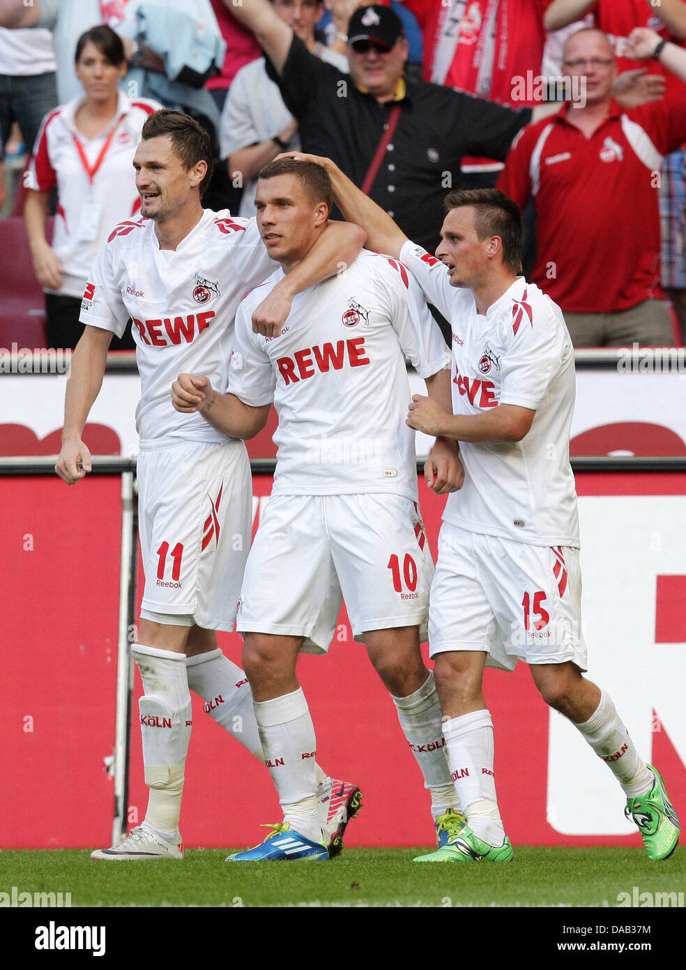 Cologne's Milivoje Novakovic (L) and Slawomir Preszko (R) celebrate the ...