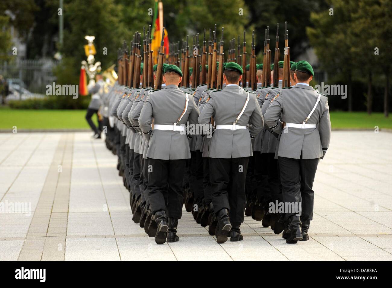Troops of the Bundeswehr's Guards Regiment march in columns to their ...