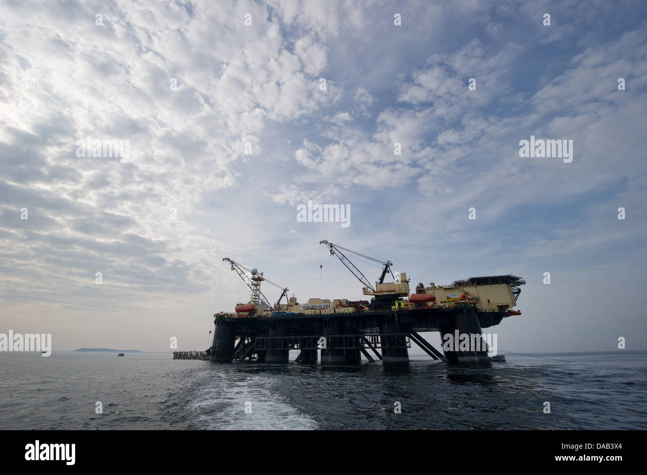 The pipe-laying vessel 'Castoro Sei' is towed by an anchor handling tug ...