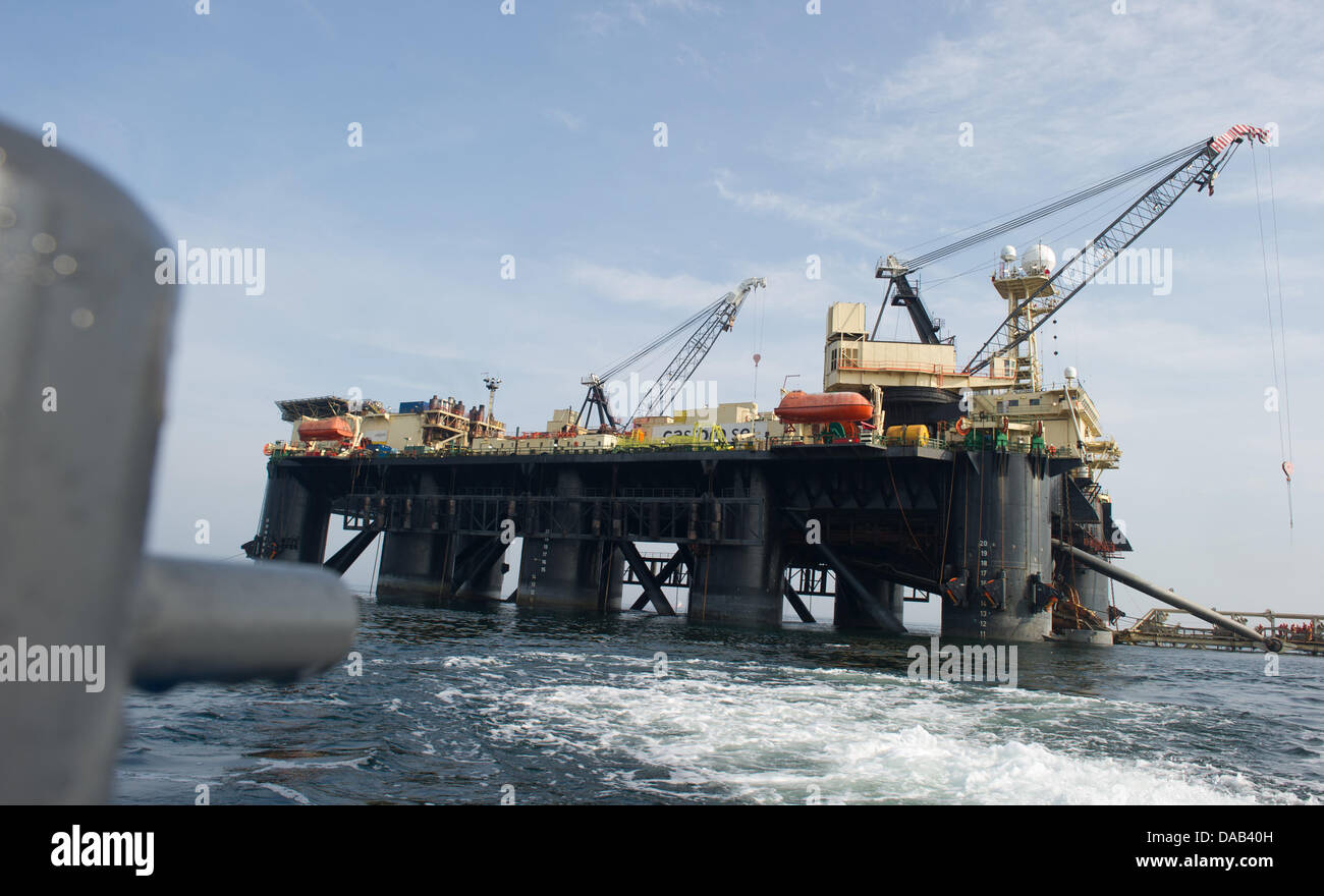 The pipe-laying vessel 'Castoro Sei' is towed by an anchor handling tug ...