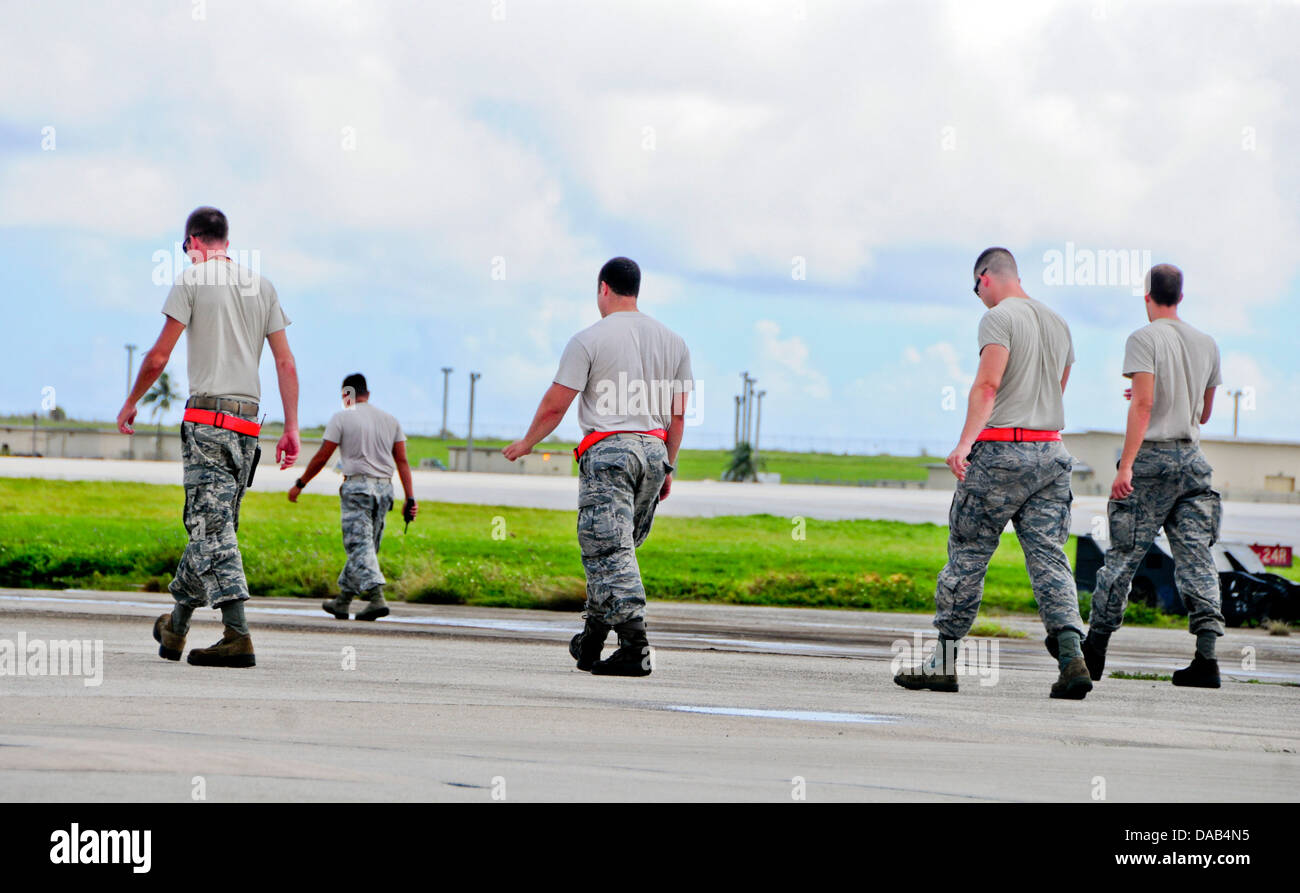 Airmen from the 36th Expeditionary Aircraft Maintenance Squadron checks ...