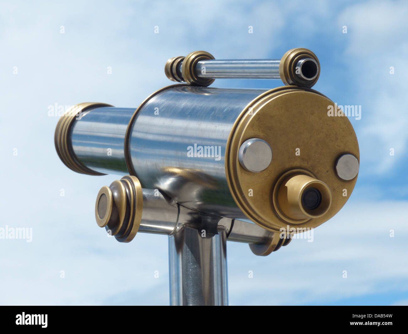 This image shows a person using a telescope or binoculars to observe ...