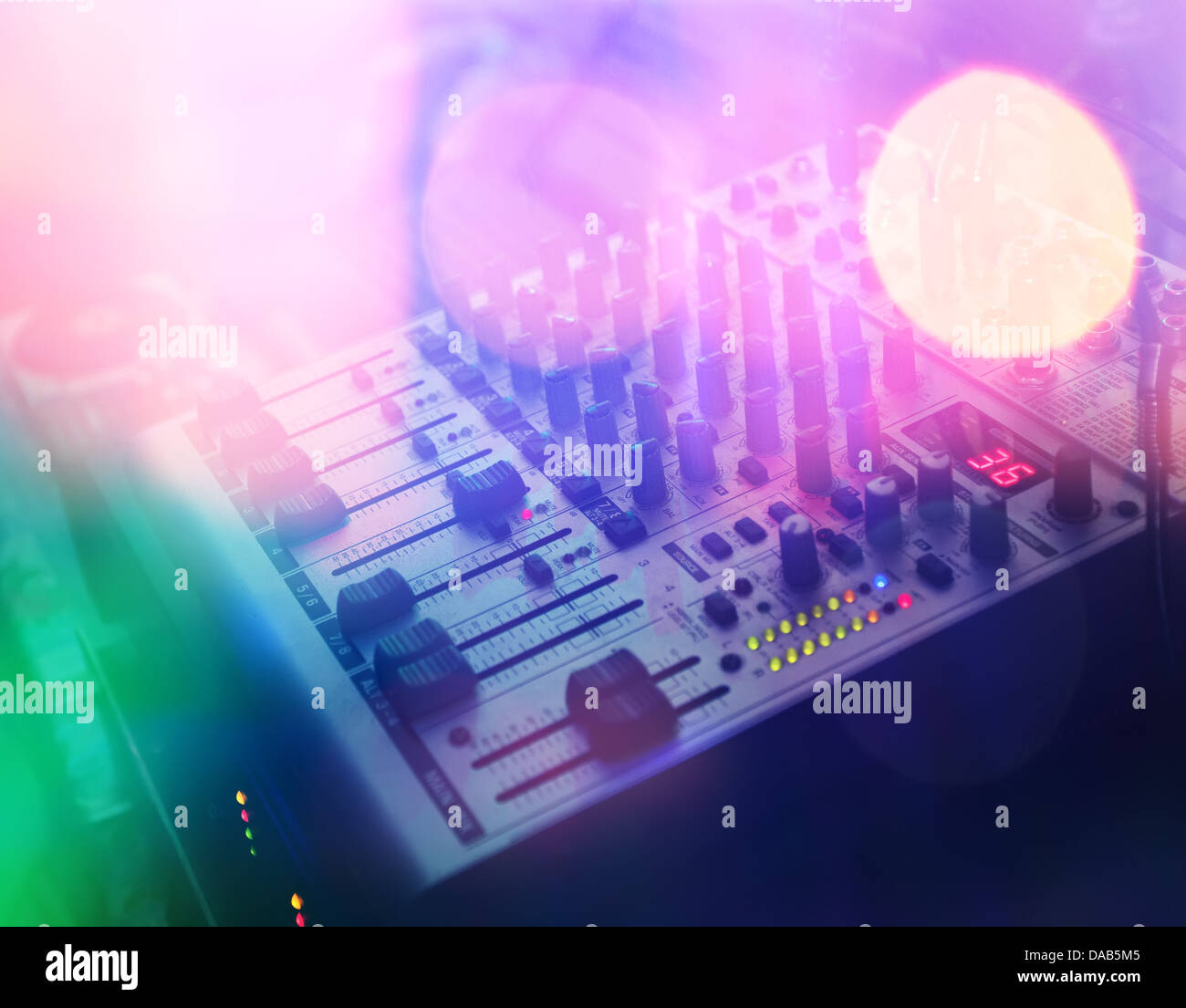 dj console in colorful music night club Stock Photo - Alamy