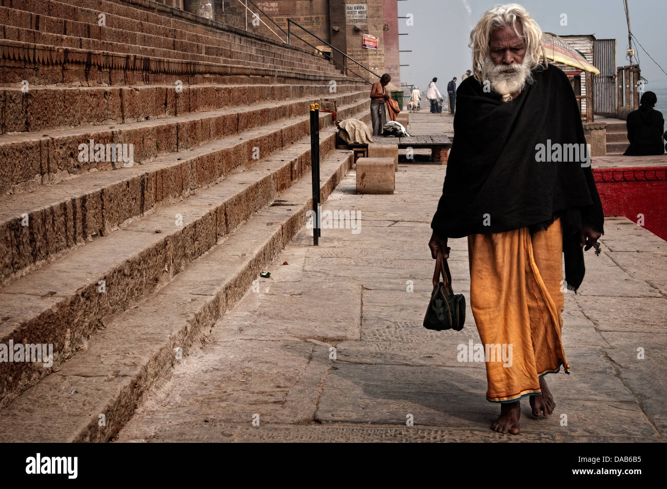 Sadhu walking ghats varanasi hi-res stock photography and images - Alamy