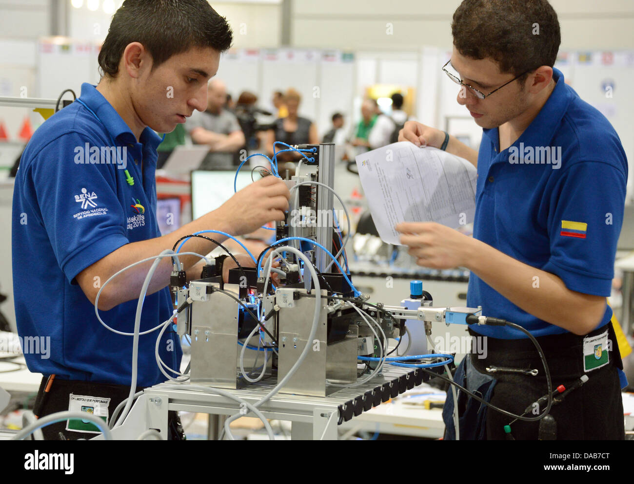 Mechatronic engineer Sebastian Ortega Mejia (R) and Juan Sebastian ...