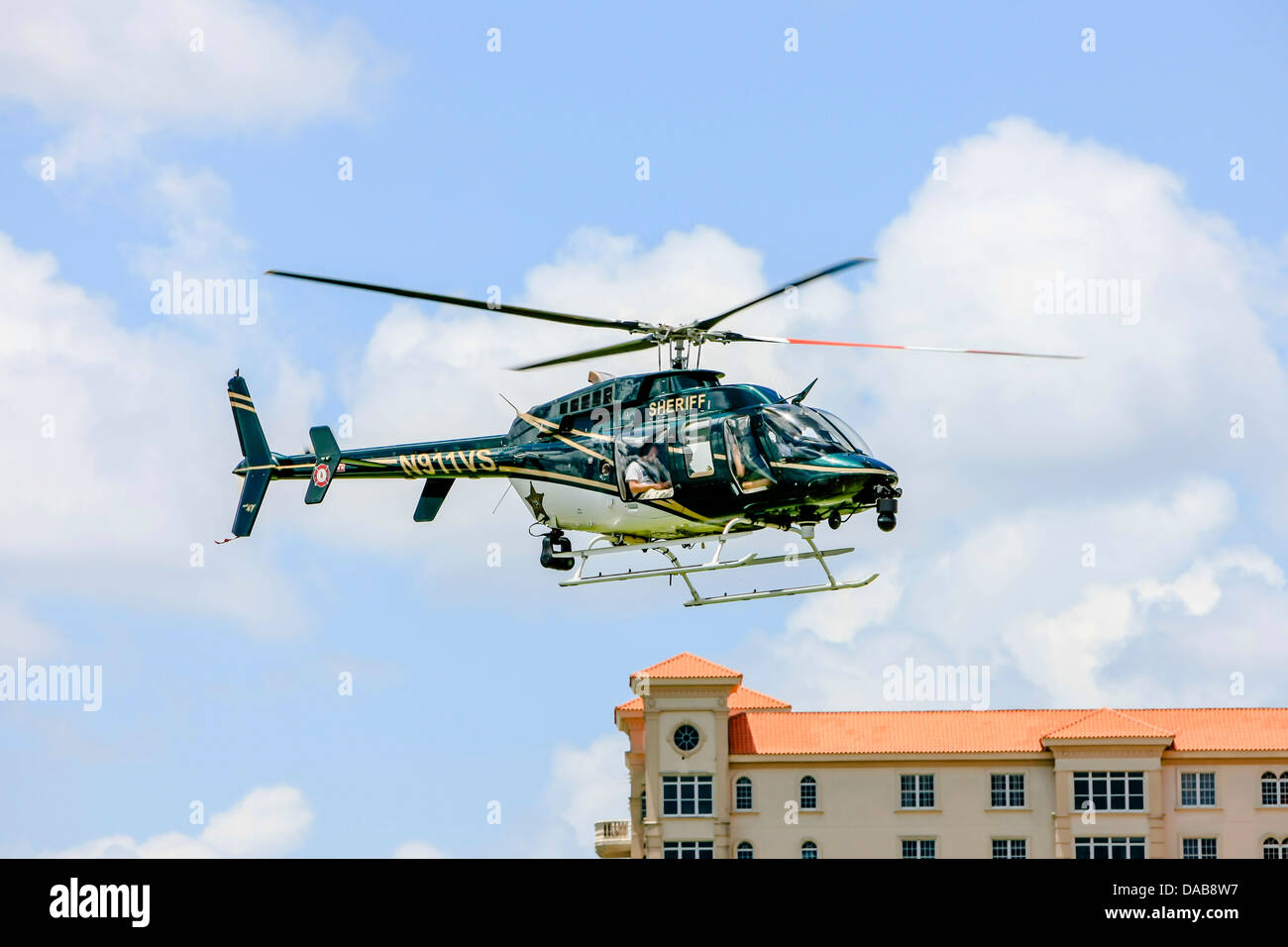 Sarasota Police Bell Jet Ranger Helicopter making a loss pass over the ...
