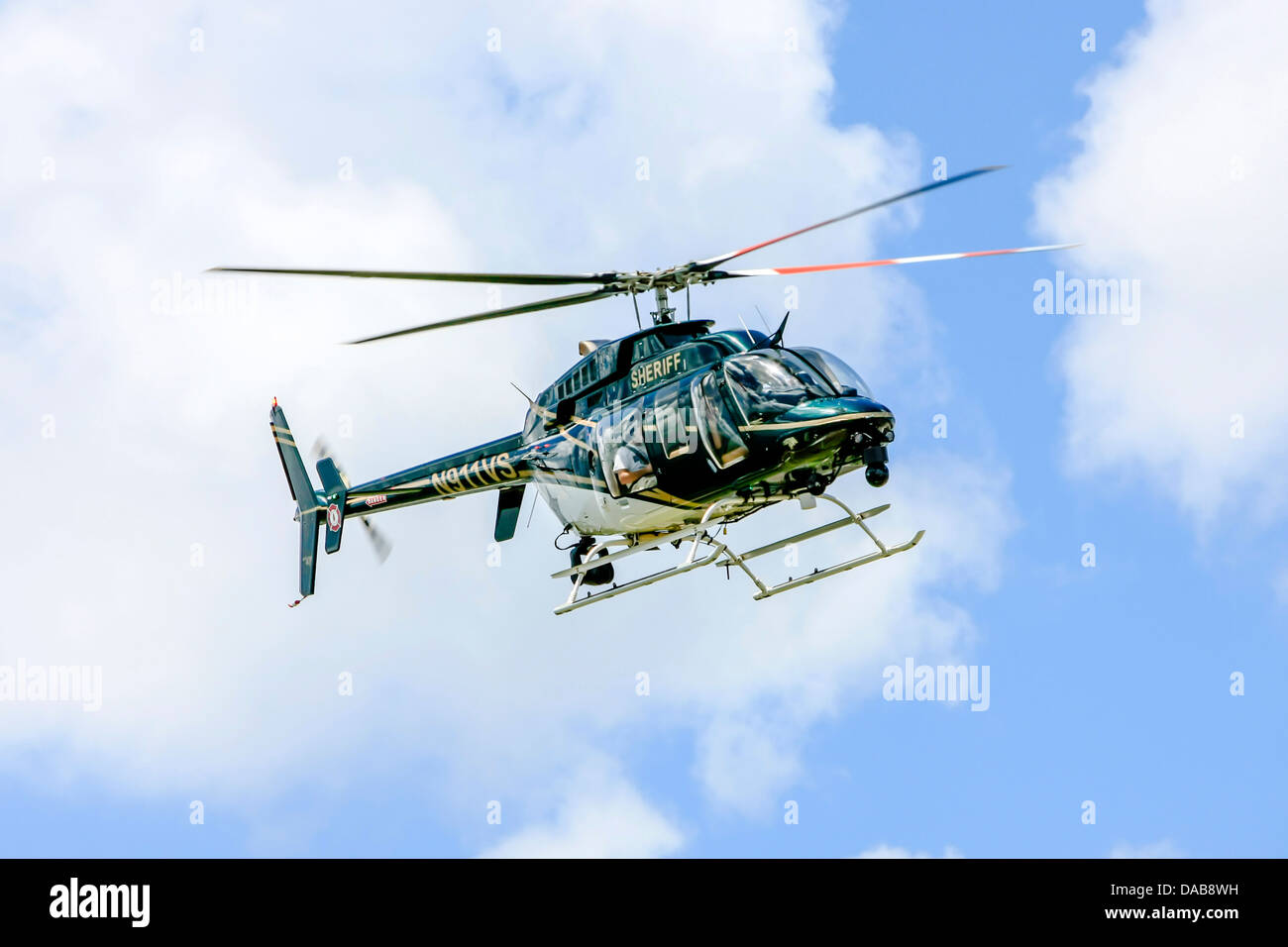 Sarasota Police Bell Jet Ranger Helicopter making a loss pass over the ...