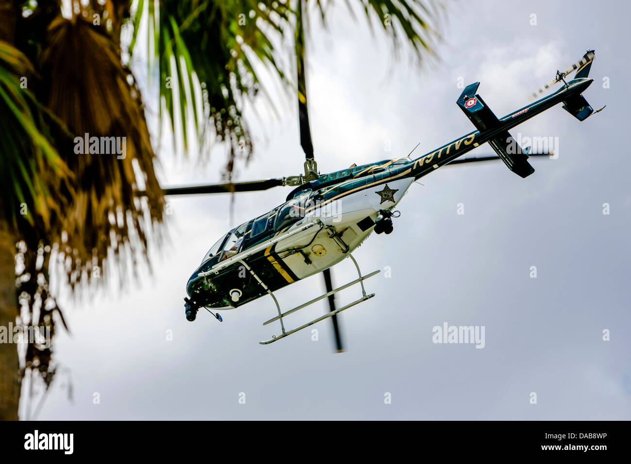Sarasota Police Bell Jet Ranger Helicopter making a loss pass over the ...