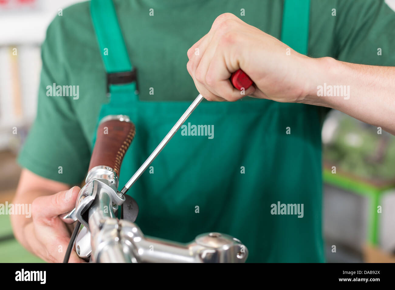 Repairing cycle hi-res stock photography and images - Alamy
