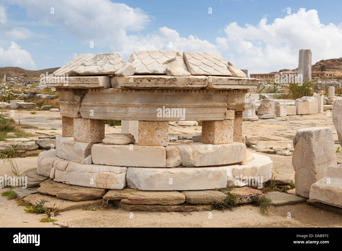 A small circular building in the Agora of Competaliasts, Delos ...