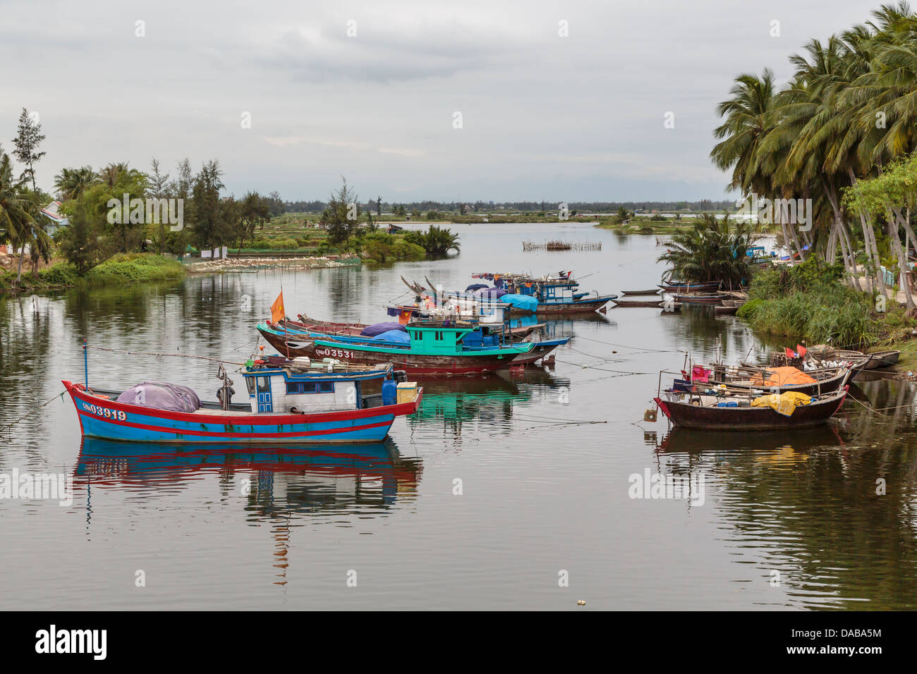An assortment of fishing boats at a small fishing village near Da Nang ...