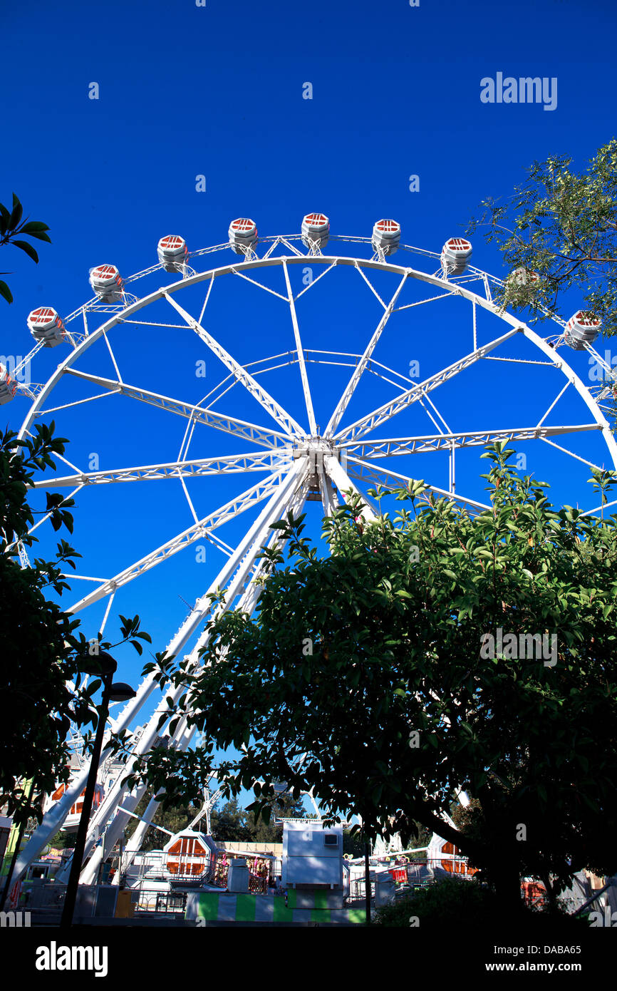 Summer day in circus, ferris wheel Stock Photo - Alamy