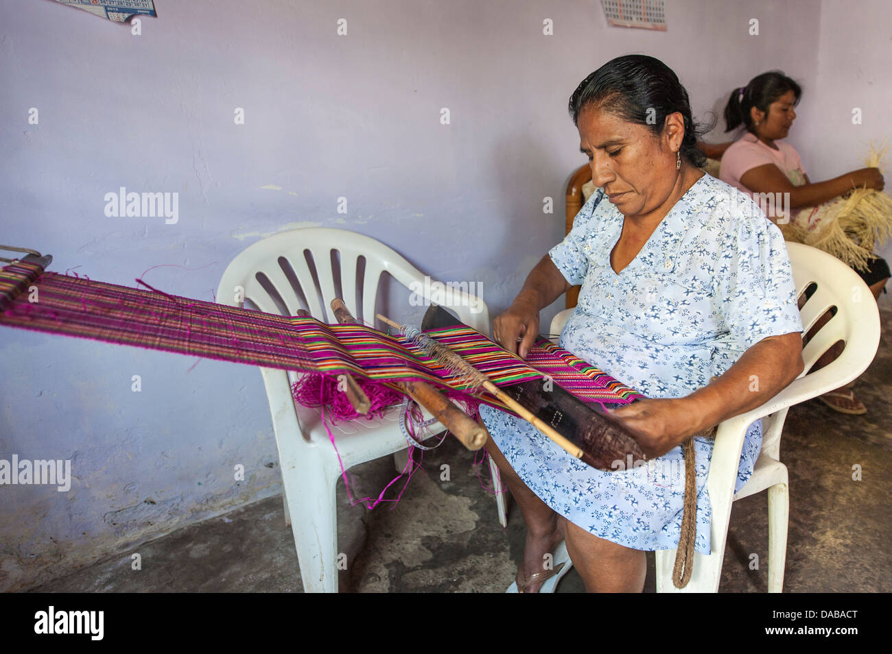 Inca incan woman weavers weaving working with wool straw back strap ...