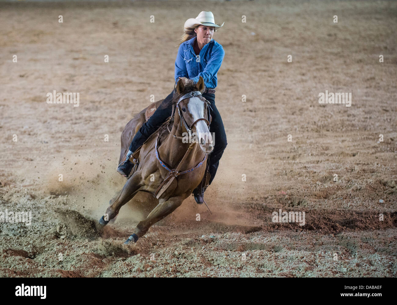 Cowgirl Participant in a Barrel racing competition at the Helldorado ...