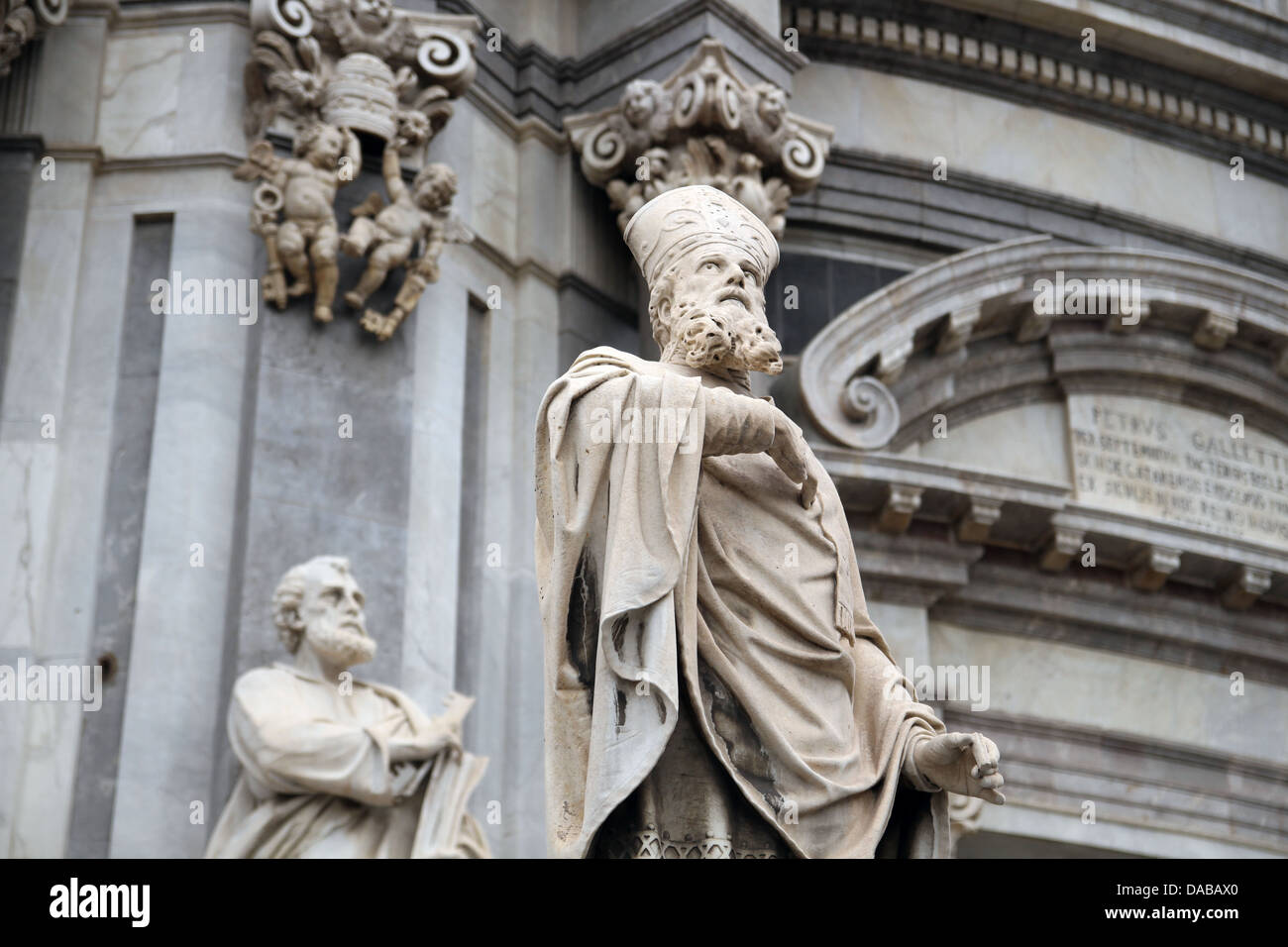 Statue outside Catania Cathedral which is a Roman Catholic cathedral ...