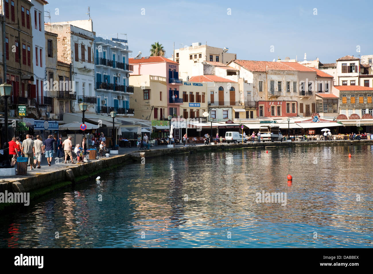 A broad promenade lined with tourist shops and cafes circles the lovely ...